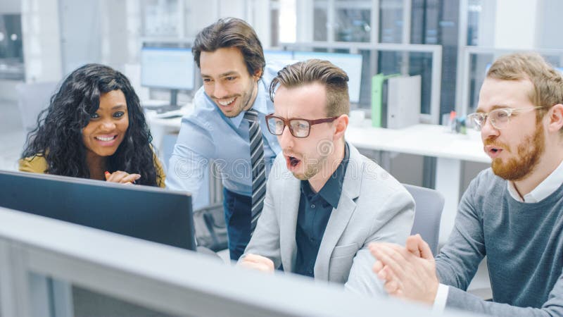 In Modern Office: Diverse Team of Young Motivated Businessmen and ...