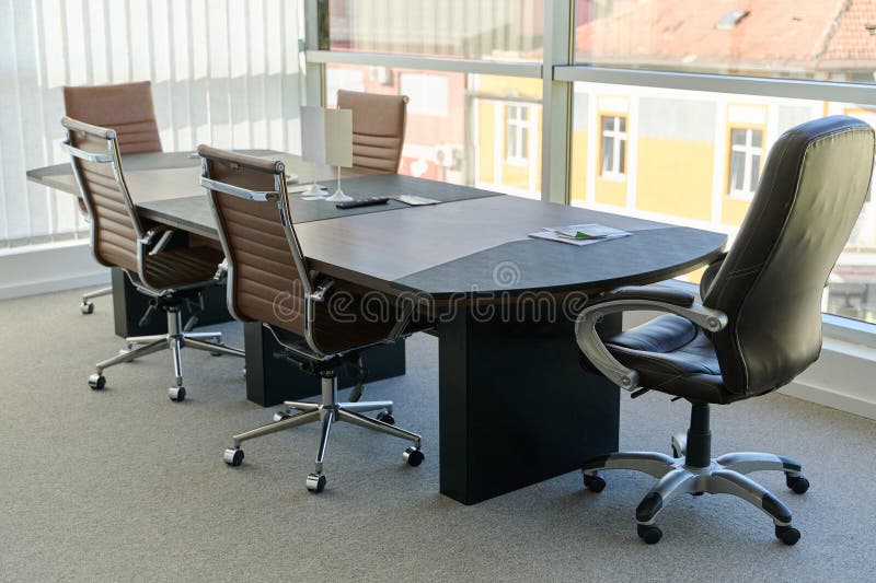 Modern Office Interior with Wooden Furniture, Conference Table, and ...