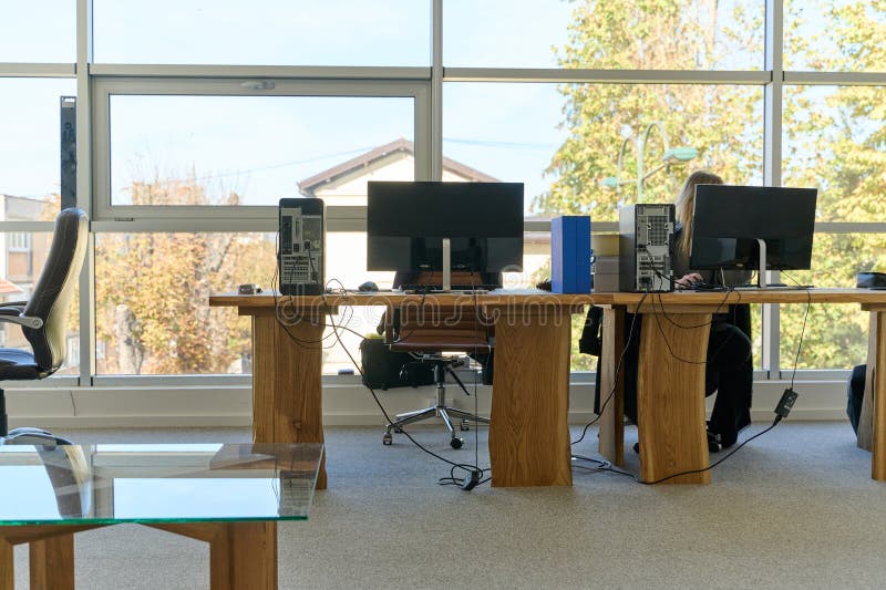 Modern Office Interior with Wooden Furniture, Conference Table, and ...