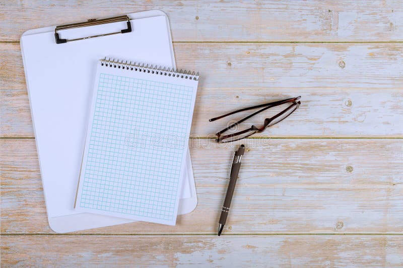 In Modern Office, Notebook, Glasses, Pen a Can Be Seen on Table for ...