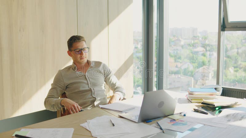 In a Modern Office, a Professional is Dedicated To Thorough ...