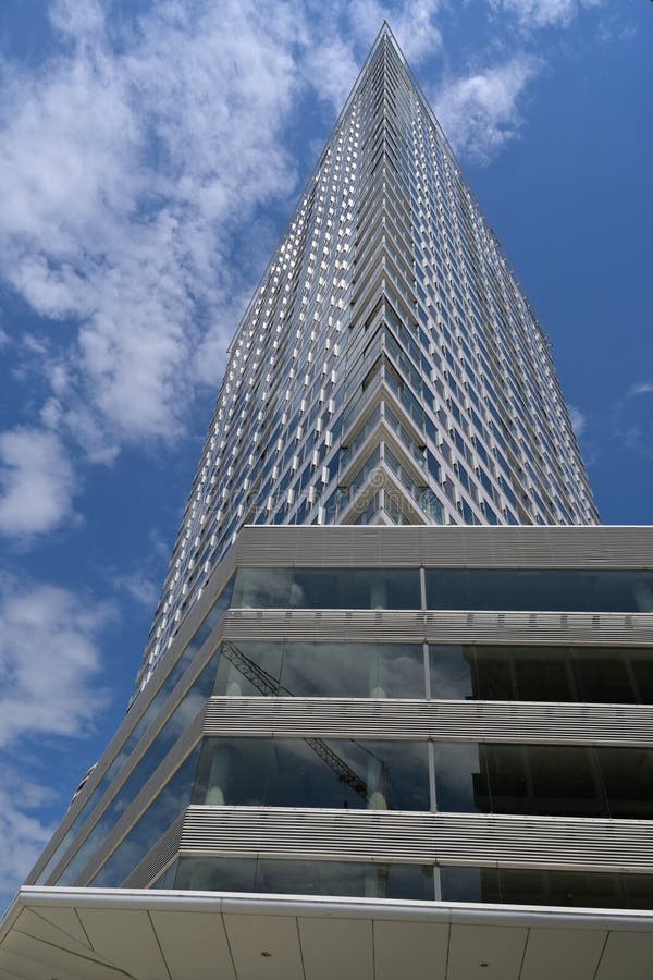 Modern Office Skyscraper with Cloudy Sky in the Background Stock Photo ...