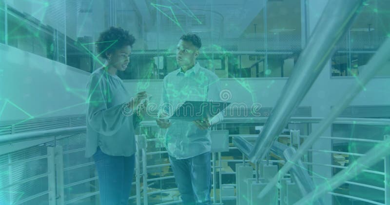 In Modern Office, Two People Discussing Digital Data Processing ...