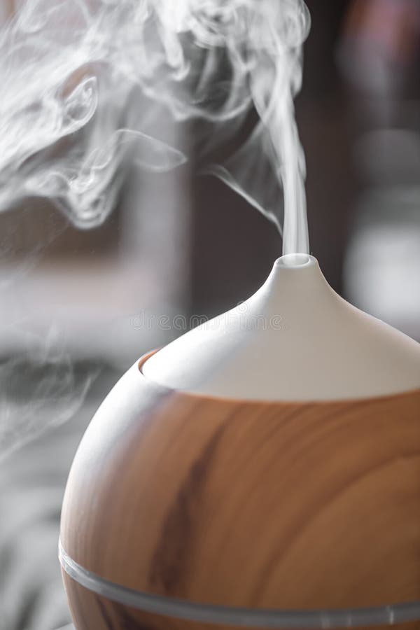 Modern Oil Aroma Diffuser Close Up on a Blurred Background Stock Photo ...