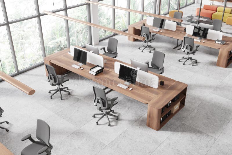 Modern Open Office with Wooden Desks and Computer Monitors on a Bright ...