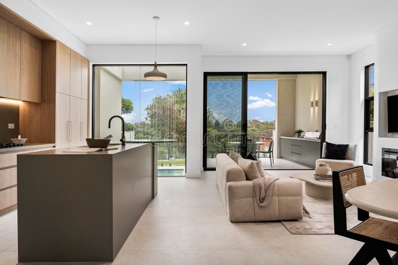 Modern Open-plan Kitchen and Living Room with Large Windows and a View ...