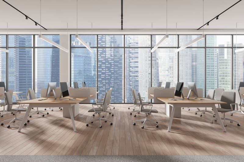 Modern Open-plan Office with Computers on Wooden Desks, Overlooking a ...