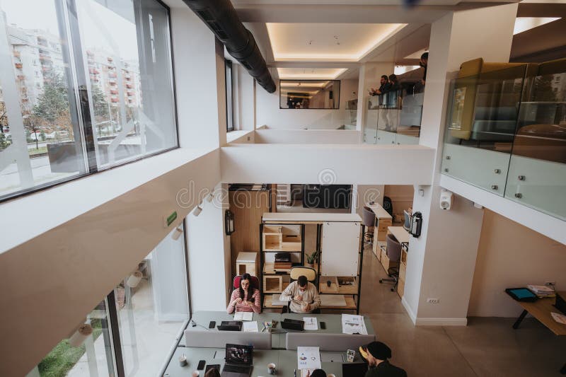 Overhead View of a Contemporary, Bright Office Environment Where ...