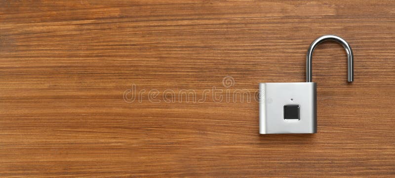 Modern Padlock on Wooden Table, Top View. Space for Text Stock Photo ...