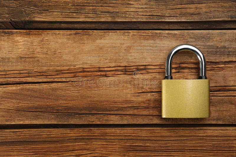 Modern Padlock on Wooden Table, Top View. Space for Text Stock Photo ...