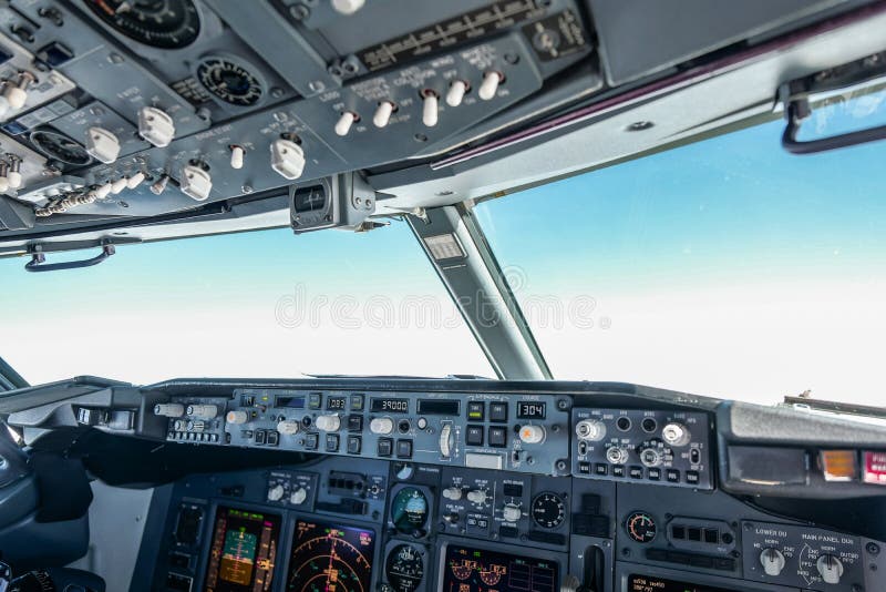 Modern Passenger Airplane Cockpit Stock Photo - Image of audience ...