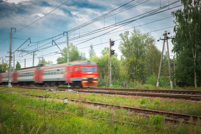 Modern Passenger Commuter Train in Motion. Railway Station Editorial ...