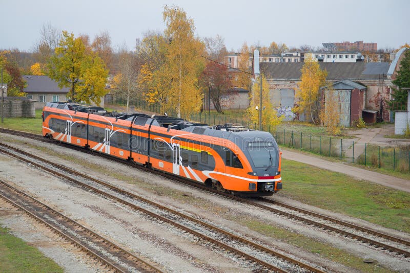 A Modern Passenger Diesel Train on the Line at Narva. Estonia Editorial ...