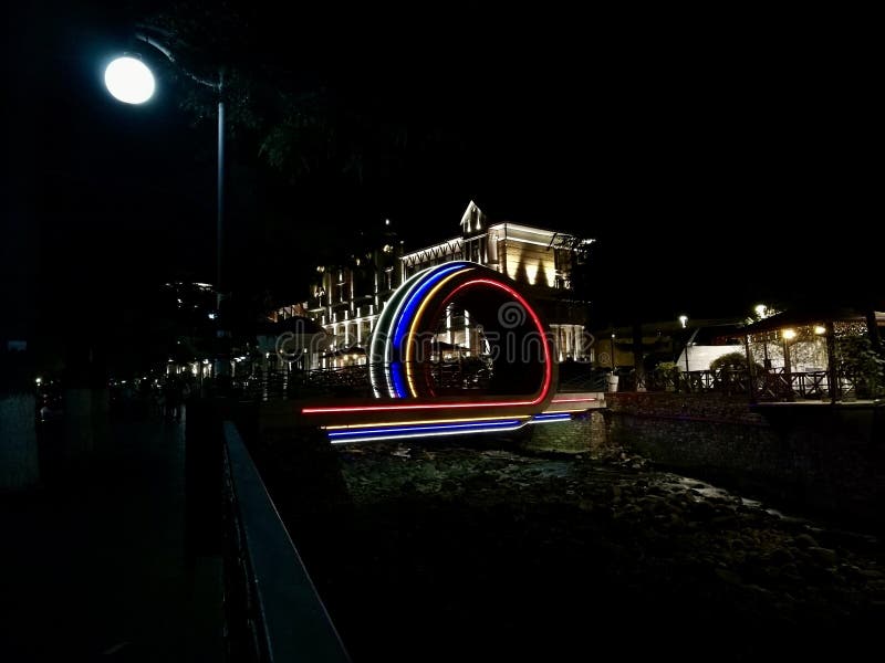 Modern Pedestrian Mobius Loop Bridge at Night. Stock Image - Image of ...
