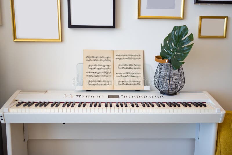 Modern Piano with Music Sheets in Room, Closeup Stock Image - Image of ...