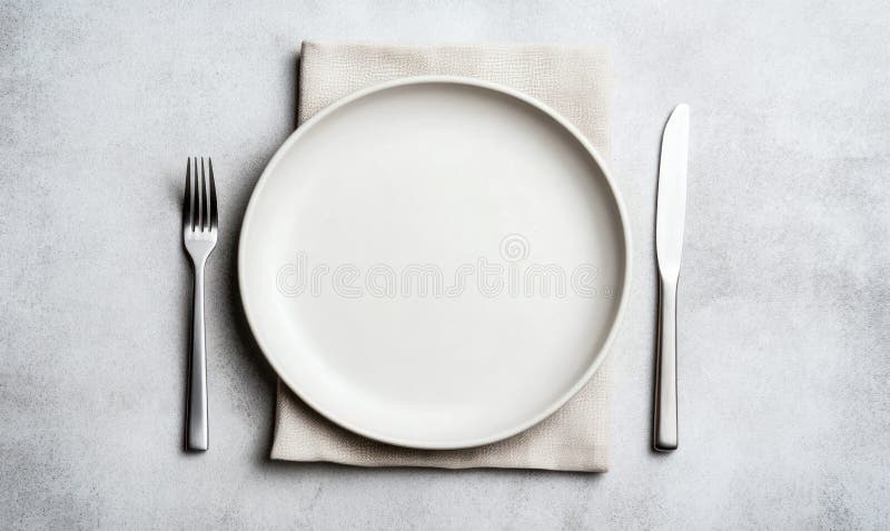 A Modern Place Setting Features a White Plate, Linen Napkin, and ...