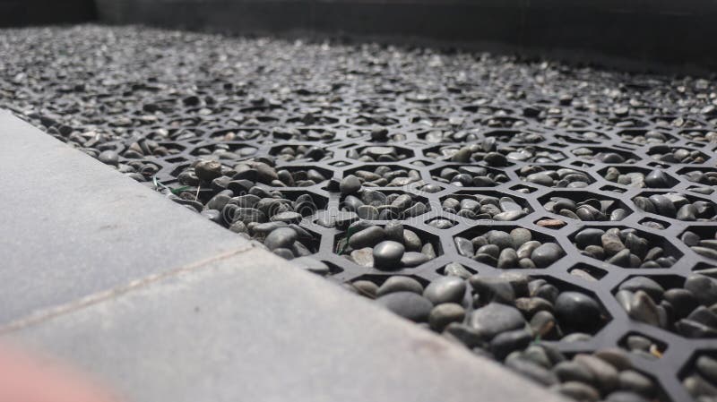 Modern Plastic Grid with Pebble Filling in Outdoor Design Stock Photo ...