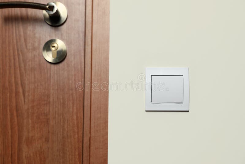 Modern Plastic Light Switch on White Wall Indoors Stock Image - Image ...