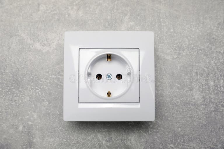 Modern Plastic Power Socket on Grey Table, Top View Stock Photo - Image ...