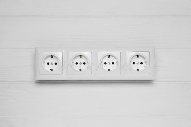 Modern Plastic Power Socket on White Wooden Table, Top View Stock Photo ...
