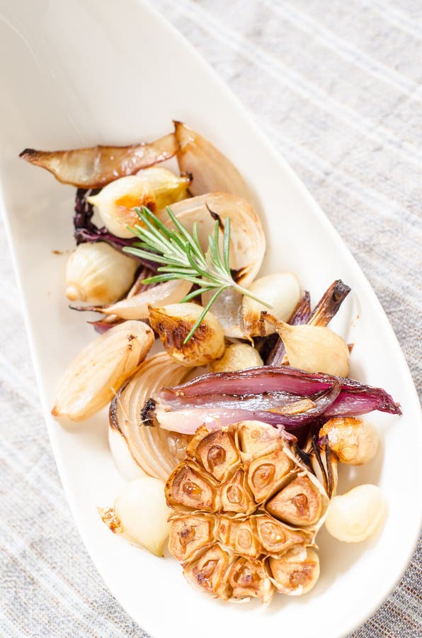 Modern Plate with Baked Onion Stock Image - Image of rakkyo, yellow ...