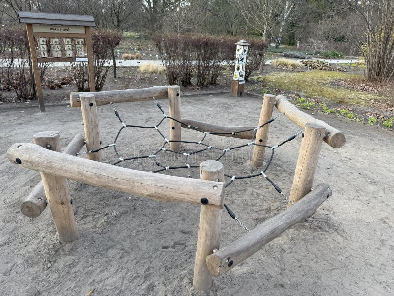 A Playground in the Park with an Interactive Board about Trees and ...