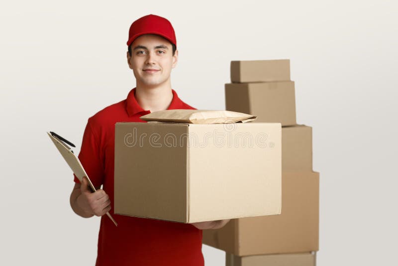 Modern Post and Online Orders. Postman Issues Large Parcel Stock Photo ...
