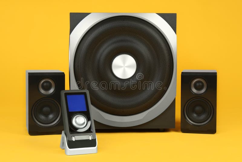 Modern Powerful Audio Speaker System Remote Yellow Background Stock ...