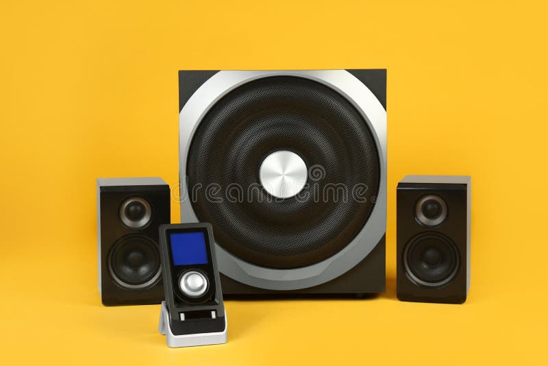 Modern Powerful Audio Speaker System Remote Yellow Background Stock ...
