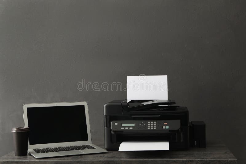 Modern Printer with Paper and Laptop on Grey Table Stock Image - Image ...