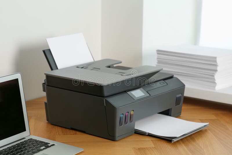 Modern Printer with Paper and Laptop on Wooden Table Stock Image ...