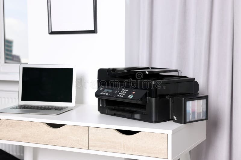 Modern Printer with Paper Near Laptop on White Desk at Home Stock Image ...
