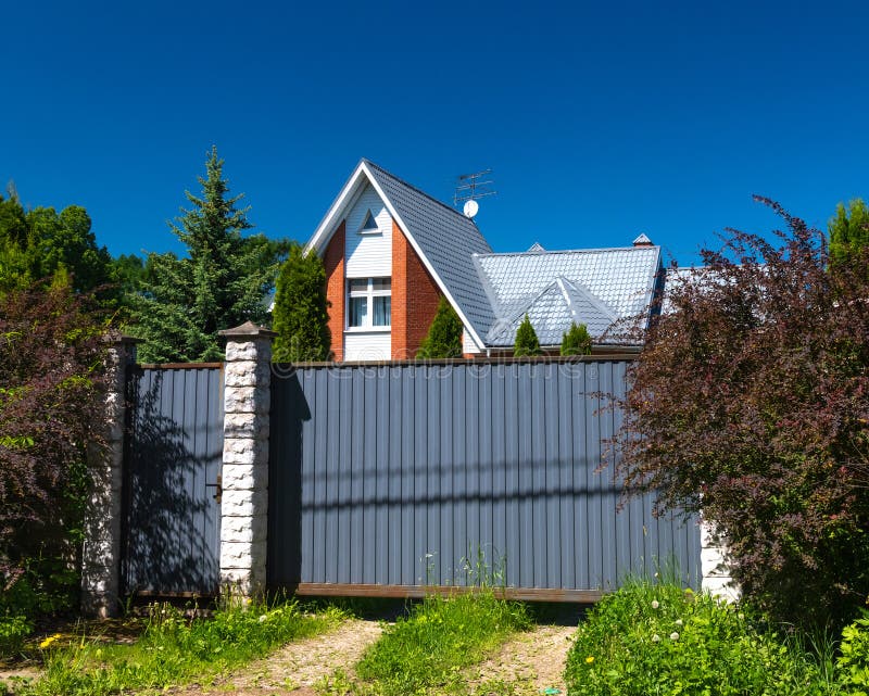 Modern Private House Behind the Fence in Summer Stock Image - Image of ...