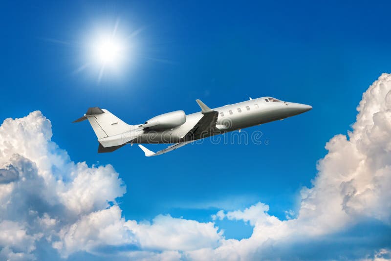 Private Jet Flies in the Air Above the Clouds Stock Photo - Image of ...