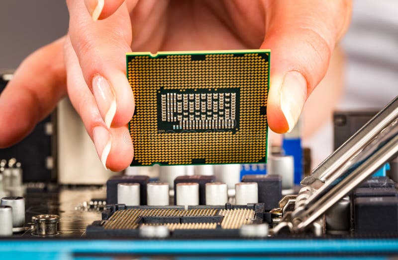 Modern Processor and Motherboard Stock Image - Image of finger ...