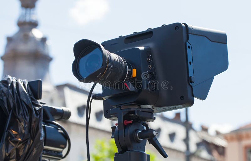 Camera set up on tripod stock photo. Image of multimedia - 233677336