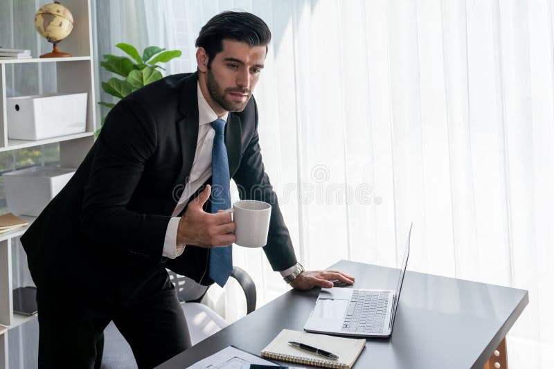 Modern Professional Businessman at Modern Office Desk with Coffee ...