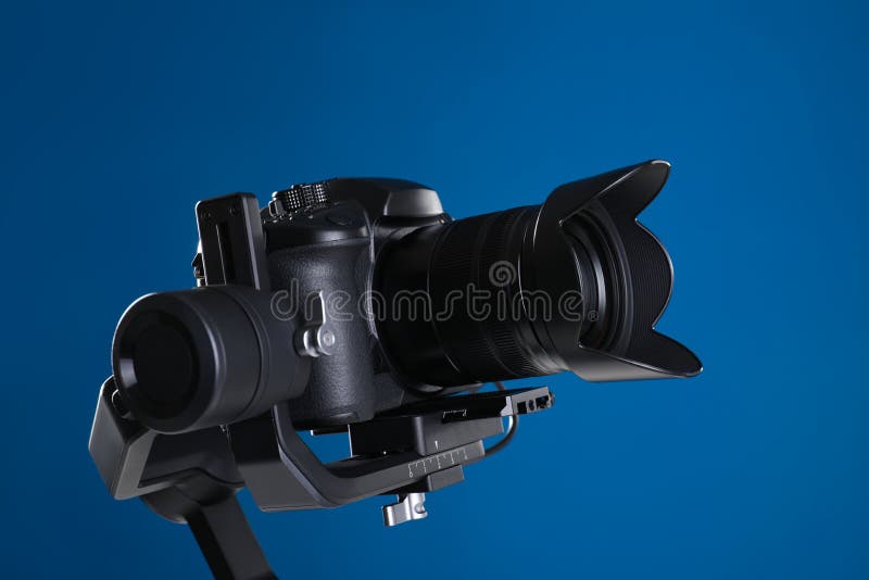 Modern Professional Video Camera on Background Stock Photo - Image of ...