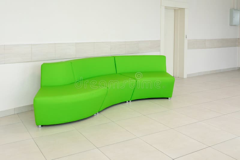 Modern Public Building Interior Featuring a Bright Green Modular Sofa ...
