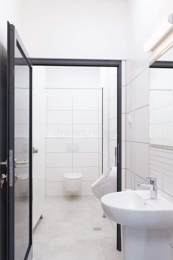 Modern Public Restroom with Sink, Urinal and Toilet Stock Photo - Image ...