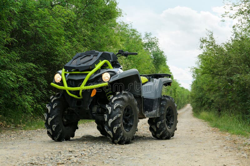 Modern Quad Bike on Pathway Near Trees Outdoors Stock Image - Image of ...