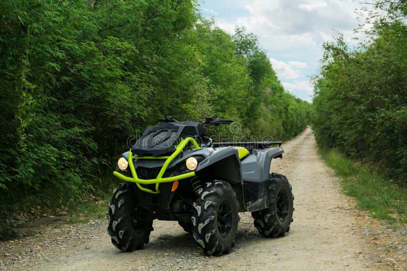 Modern Quad Bike on Pathway Near Trees Outdoors Stock Image - Image of ...