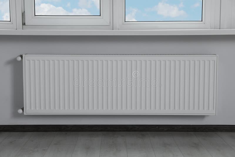 Modern Radiator Under Window in Office. Interior Design Stock Photo ...