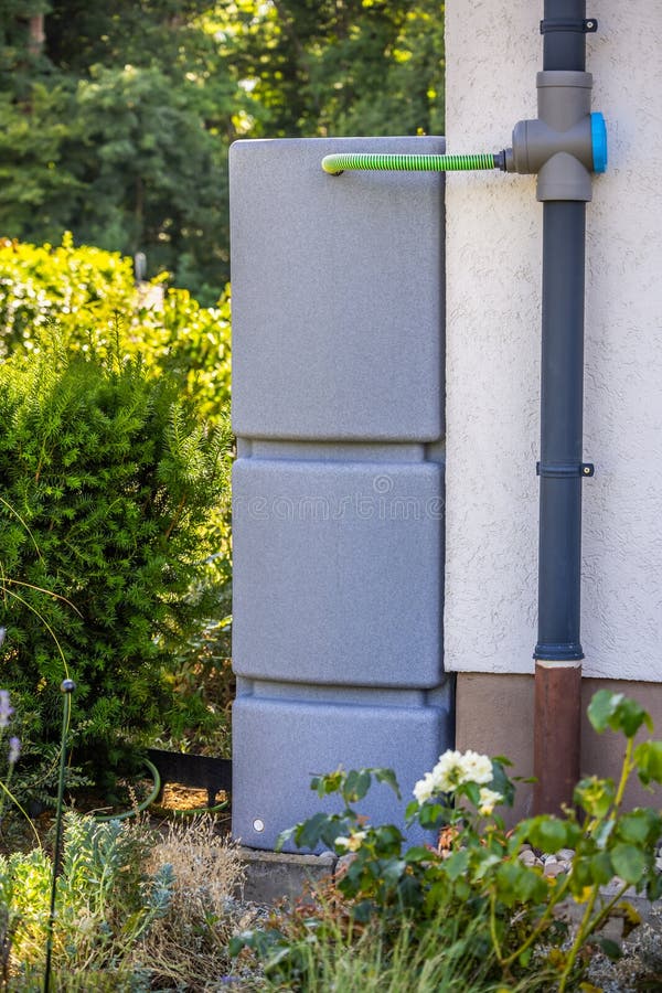 Modern Rainwater Tank, Harvesting and Re-usage of Rainwater Stock Photo ...