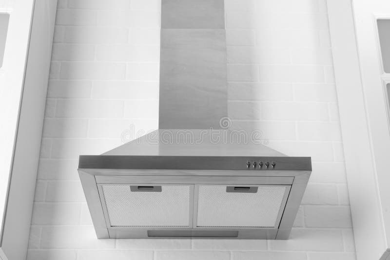 Modern Range Hood on White Brick Wall in Kitchen Stock Image - Image of ...