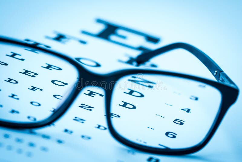 Modern Reading Glasses on a Eye Sight Test Chart Stock Image - Image of ...