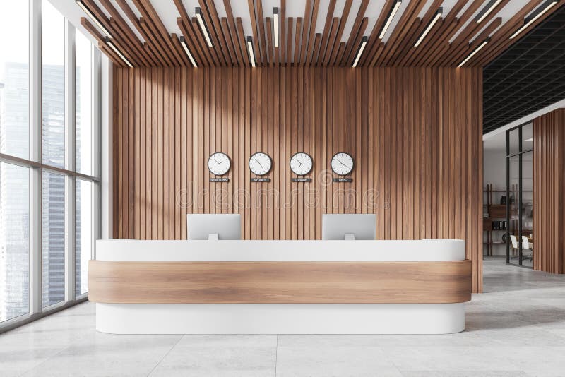 Modern Reception Desk with Computers, Clocks on Wooden Wall, Office ...