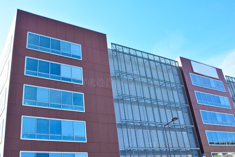Modern Red Building with Glass Windows Stock Image - Image of city ...