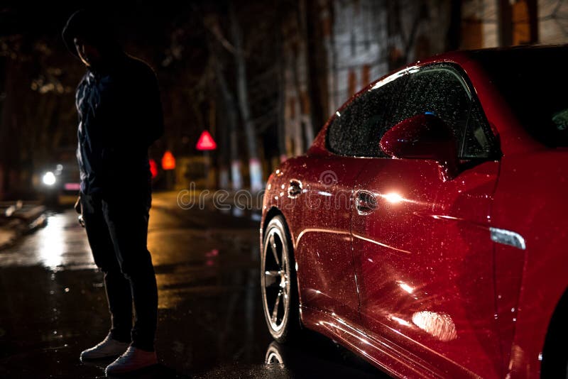Modern Red Car on Near Human. Dramatic Concept. Stock Image - Image of ...