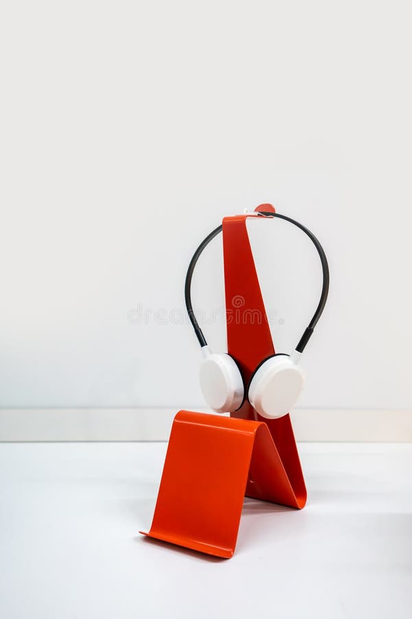 Modern Red Curve Metal Stand for Wireless Headset Isolated on White ...